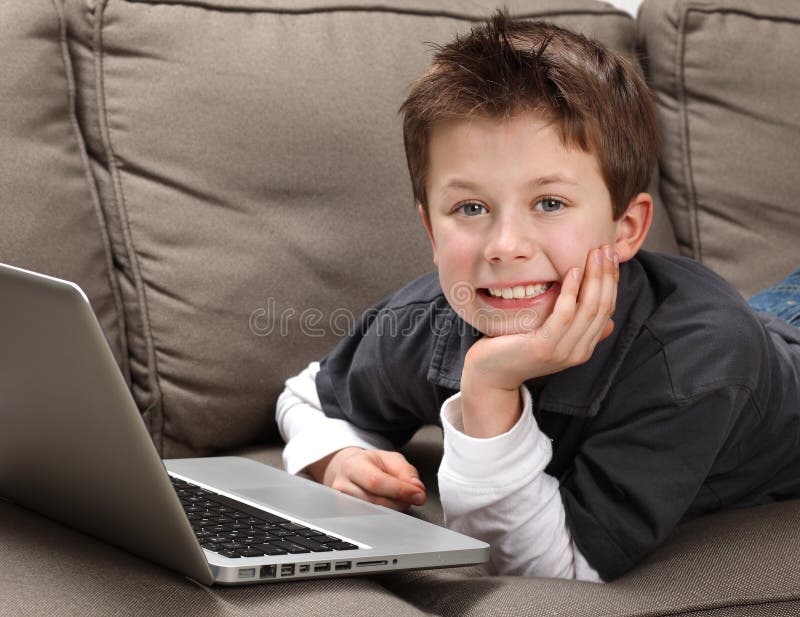 Boy with computer stock image. Image of young, hand, technology - 8818399