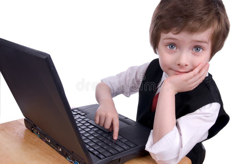 Boy on a laptop computer stock photo. Image of business - 2092104
