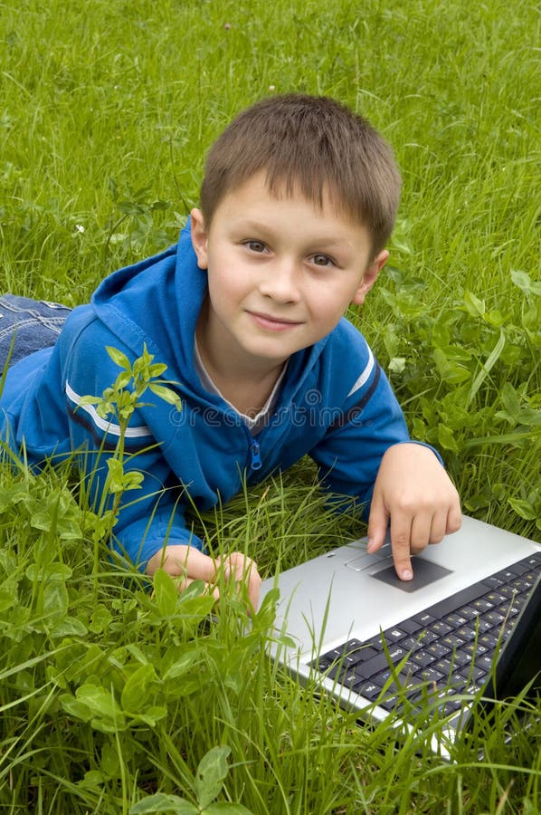 Boy with Laptop Computer on Meadow. Stock Image - Image of education ...