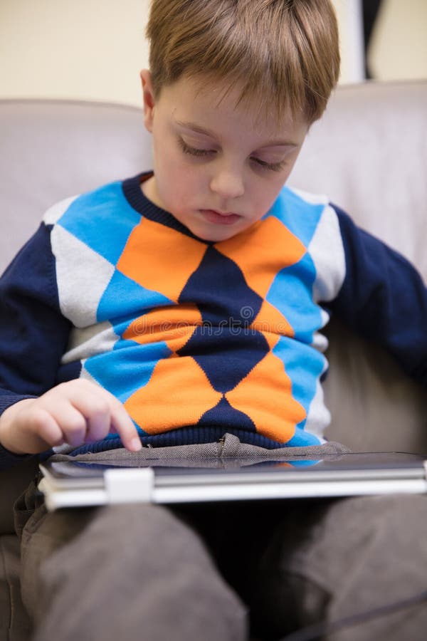 Boy with Laptop on Couch at Home Stock Photo - Image of indoor ...
