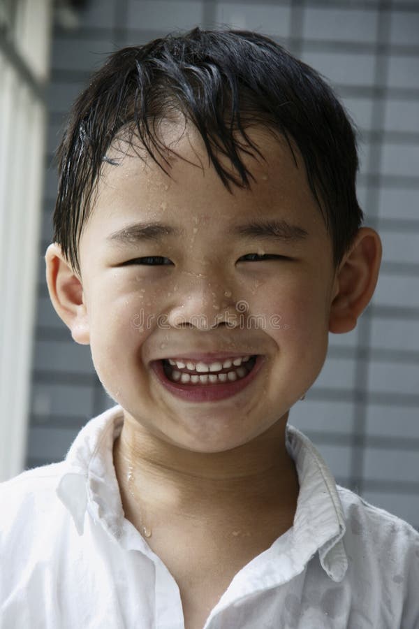 Running Child With Water Cannon Stock Image - Image of playful ...