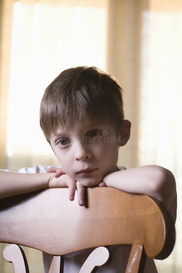 Boy lying on the table stock photo. Image of depression - 62472130