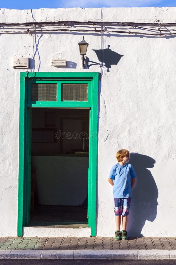 Boy Leaning at a Wall and Throwing a Funny Shadow Stock Image - Image ...