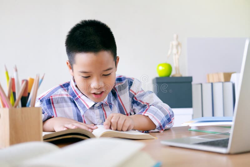 The Boy is Learning in Classroom. Education Concept. Stock Photo ...