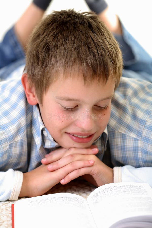 Boy Learning On The Floor Picture. Image: 3814483