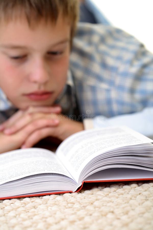 Boy Learning On The Floor Picture. Image: 3814515