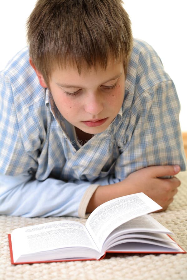 Boy Learning On The Floor Picture. Image: 3841637