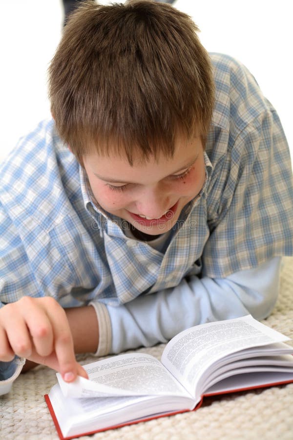 Boy learning on the floor stock photo. Image of expressive - 3841736