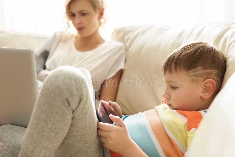 Boy is Learning How To Use a Tablet Pc at Home Stock Image - Image of ...
