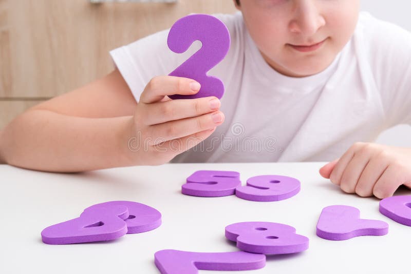 A Boy Learning Math, Count Exercises at Home, Holding Colorful Foam ...