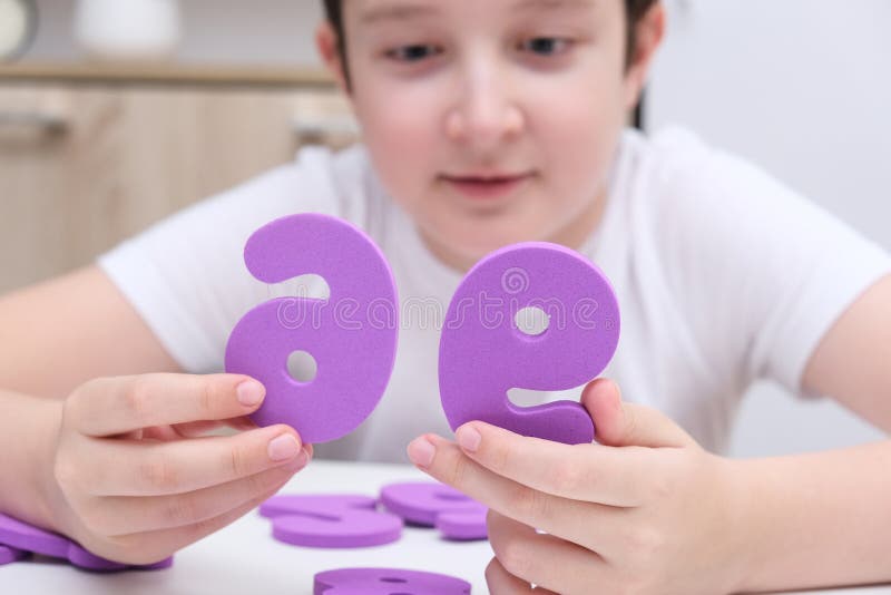 A Boy Learning Math, Count Exercises at Home, Holding Colorful Foam ...