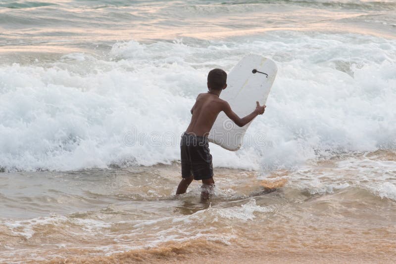 Boy is Learning Surfing on Indian Ocean Waves Editorial Image - Image ...