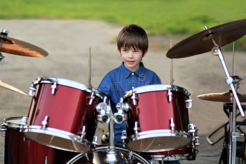 Boy learning to drum stock image. Image of music, instrument - 92065111