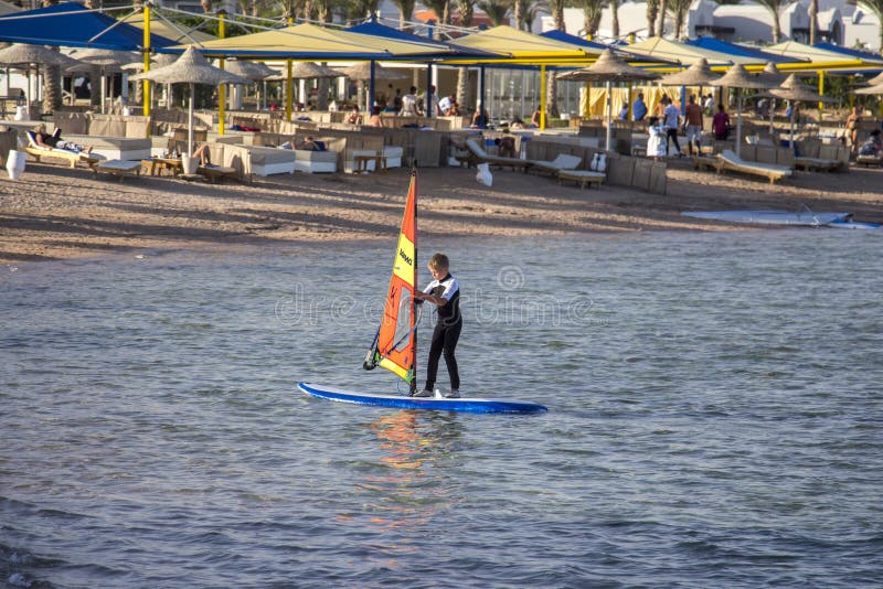 Boy Learning Windsurfing in the Sea Editorial Image - Image of outdoor ...