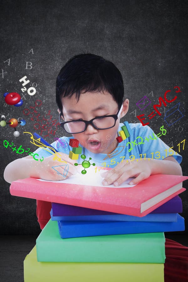 Boy Learns with Textbooks and Formula Stock Photo - Image of cute, book ...