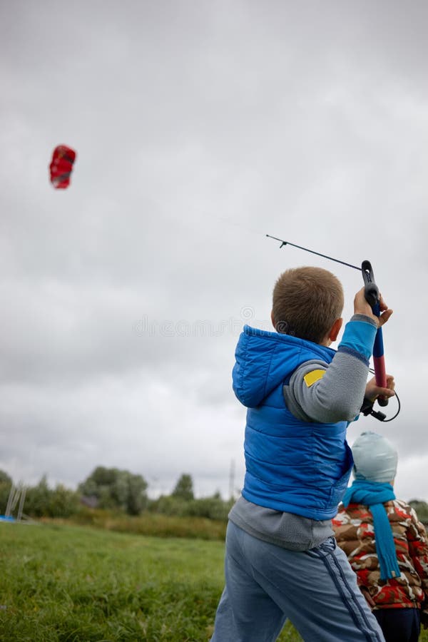 Boy Learns To Control Power Kite for Kitesurfing Stock Image - Image of ...