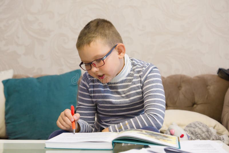 Boy Learns To Read a Big Book Stock Image - Image of studying, people ...