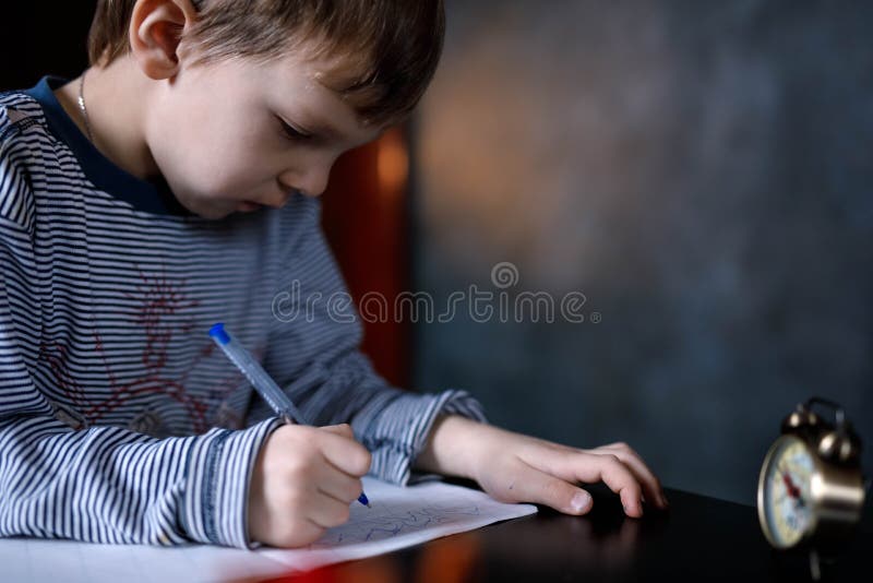 Boy learns to write stock photo. Image of hands, activity - 137055942