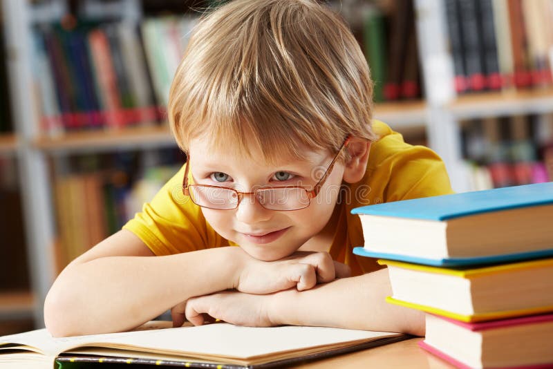 Boy in library stock photo. Image of people, academic - 19697682