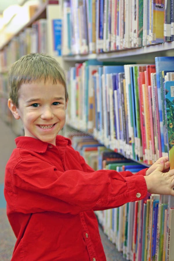 Boy in Library stock image. Image of playful, library - 2072295