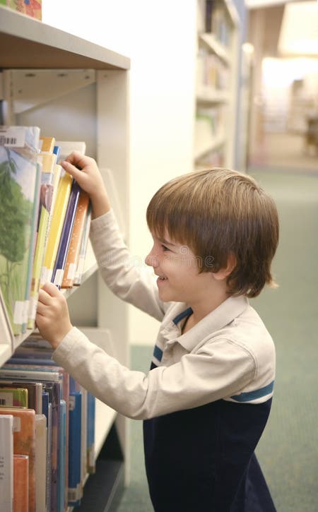 Boy in the Library stock photo. Image of desk, portrait - 4096376