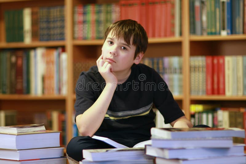Boy in the library stock photo. Image of children, boys - 4771892