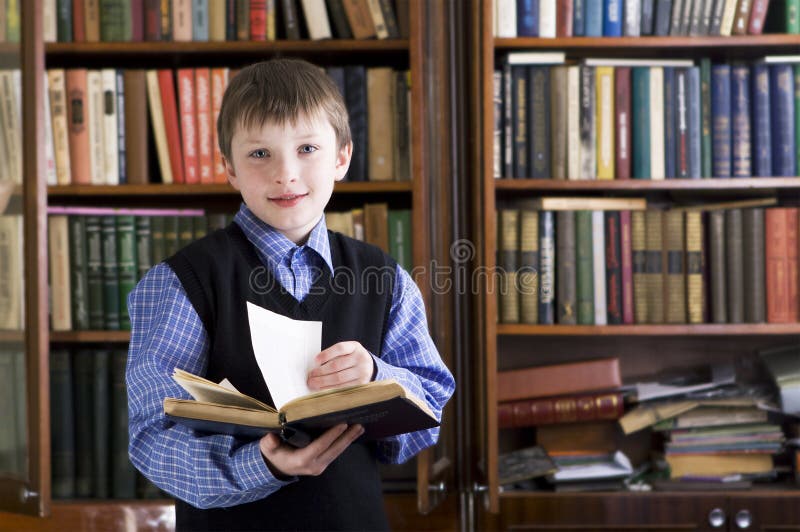 Boy in library stock image. Image of smiling, childhood - 7783573
