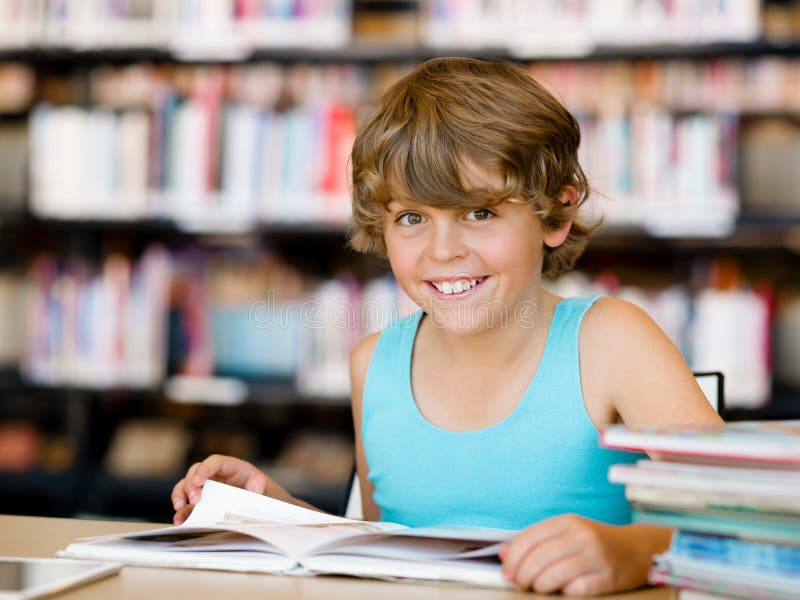 Boy in library stock image. Image of stack, literature - 54918881