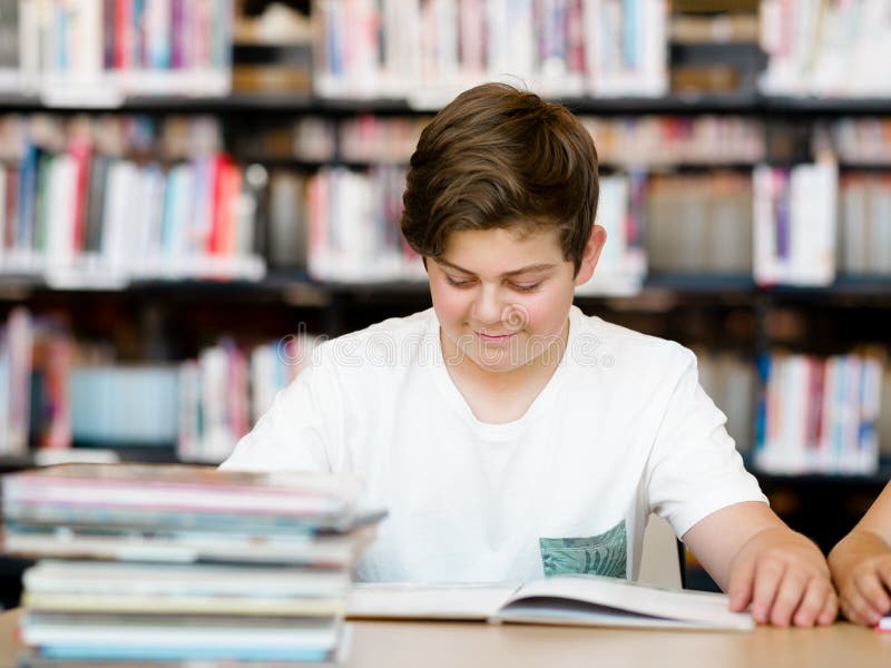 Boy in library stock image. Image of studying, male, child - 92792503