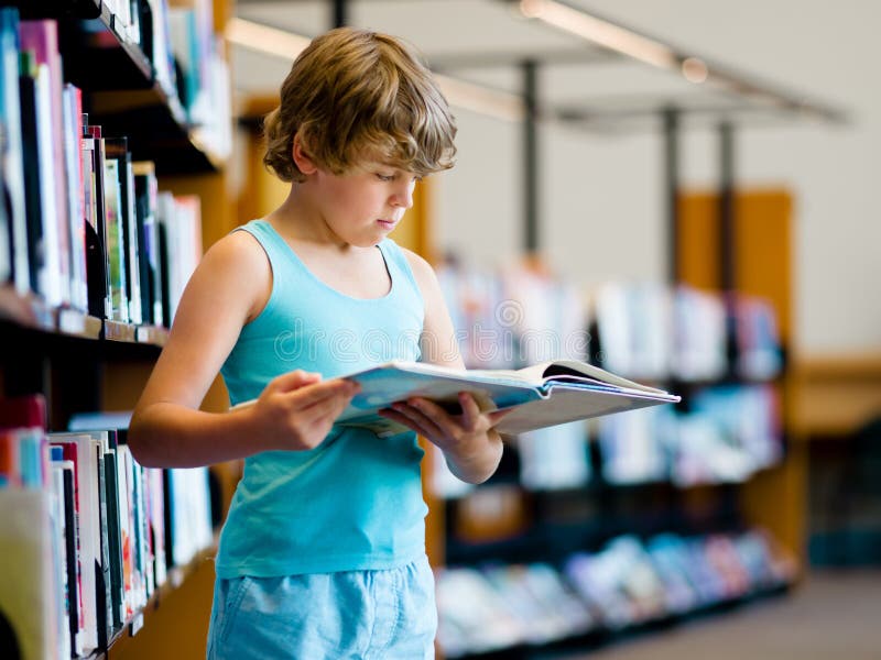 Boy in library stock image. Image of school, people, preschooler - 56385705