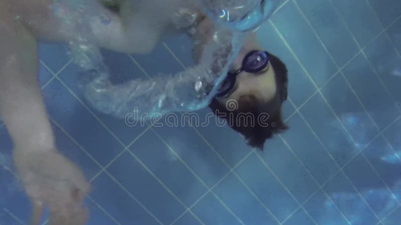 Boy Lie on Bottom of Pool and Issue Bubbles of Stock Video - Video of ...