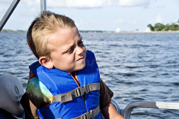 Boy in Life Vest Boating stock image. Image of toddler - 6508805