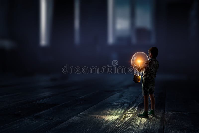 Boy with a light bulb stock image. Image of beautiful - 184164313