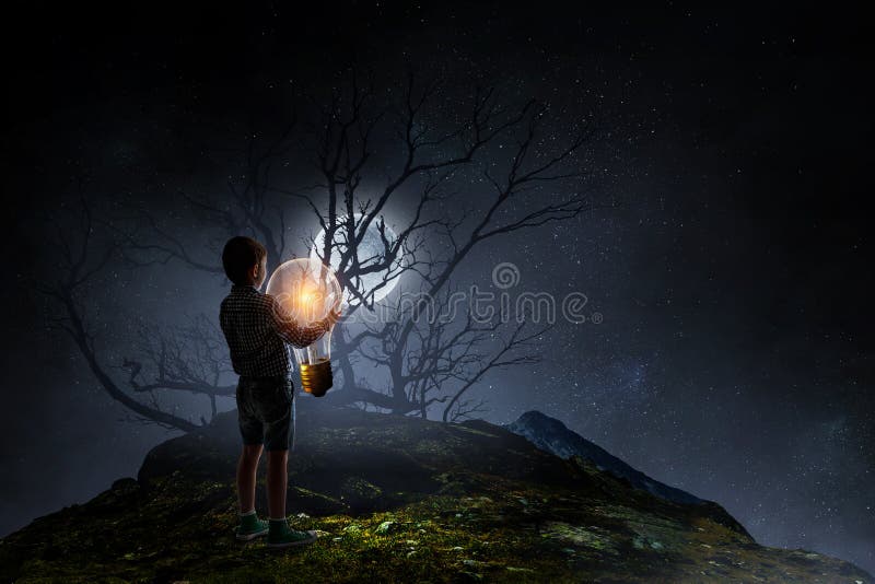 Boy with a light bulb stock image. Image of beauty, blue - 187210919