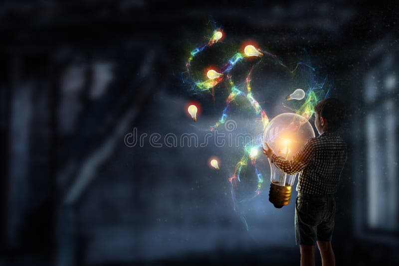 Boy with a light bulb stock image. Image of beautiful - 191356561