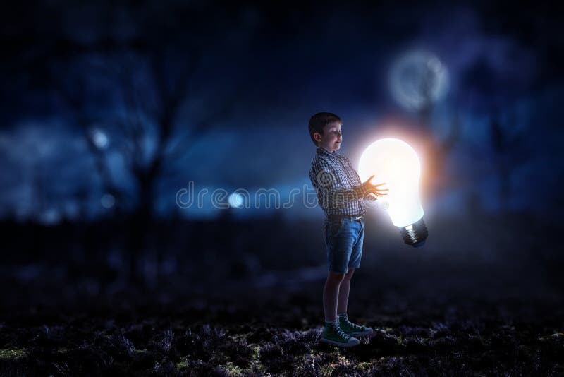 Boy with a light bulb stock image. Image of childhood - 198035283