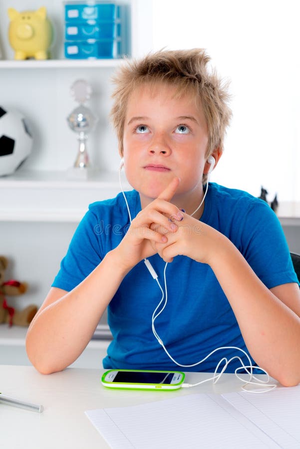 Boy is listening music stock photo. Image of nursery - 44985356