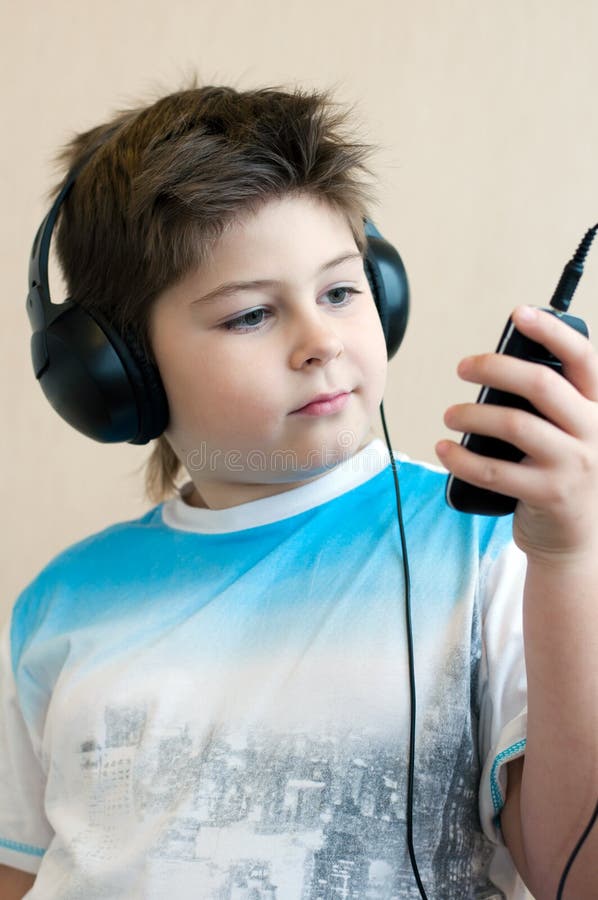 Boy Listening Music with Headphones Stock Photo - Image of happy, music ...