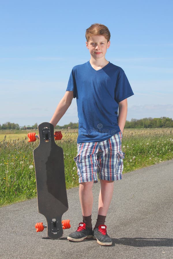 Boy with longboard stock image. Image of leisure, skateboarder - 54544075