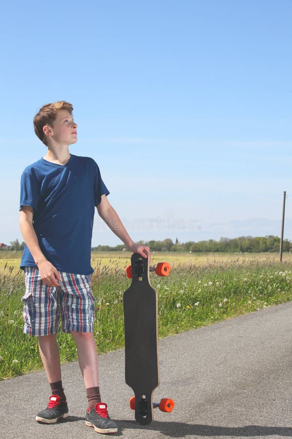 Boy with longboard stock image. Image of skateboarding - 54543873