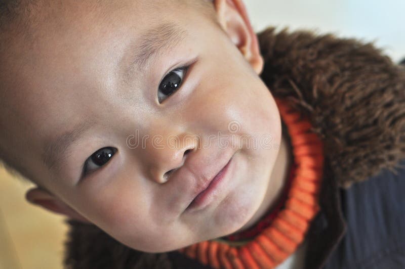 A boy look at you stock photo. Image of china, child - 25265540