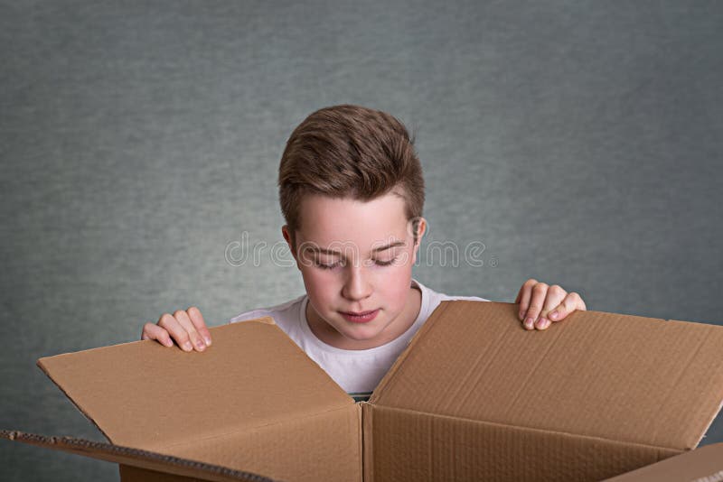 103 Boy Looking Big Cardboard Box Stock Photos - Free & Royalty-Free ...