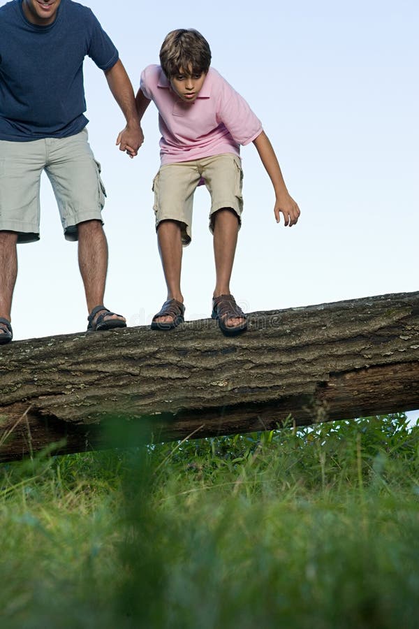 Boy Looking at Ground in Awe Stock Image - Image of nature, father ...