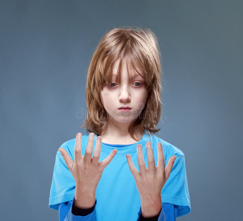 Boy in Looking at His Hands Stock Photo - Image of look, eyes: 88029952