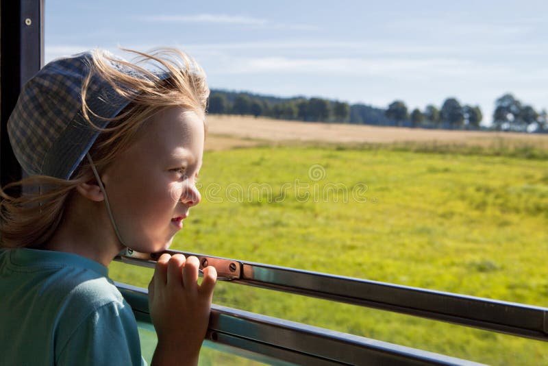 Boy Looking Out the Train Window Stock Photo - Image of passenger ...