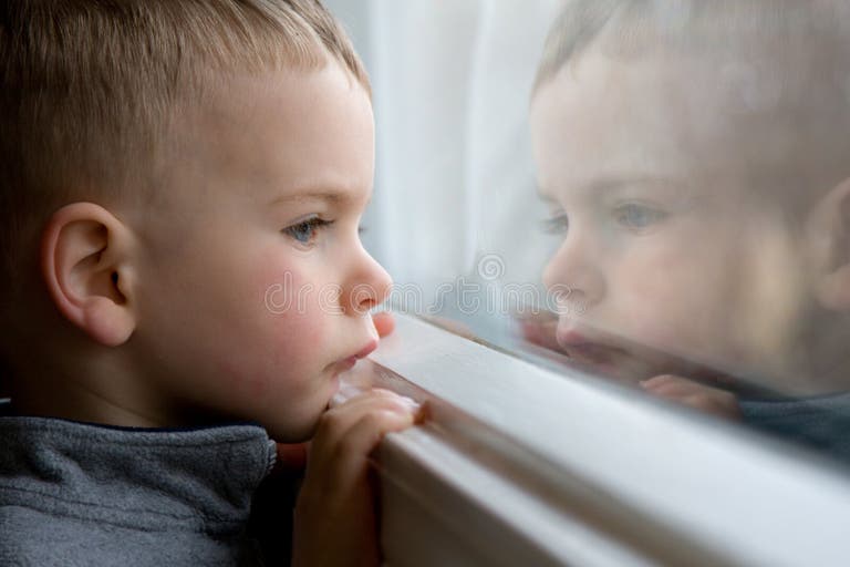 Boy looking out window stock image. Image of observe - 13819787
