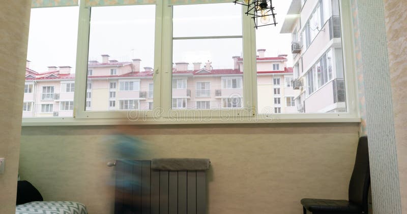 Boy Looking Out the Window Waiting for Parents at Home Alone Stock ...