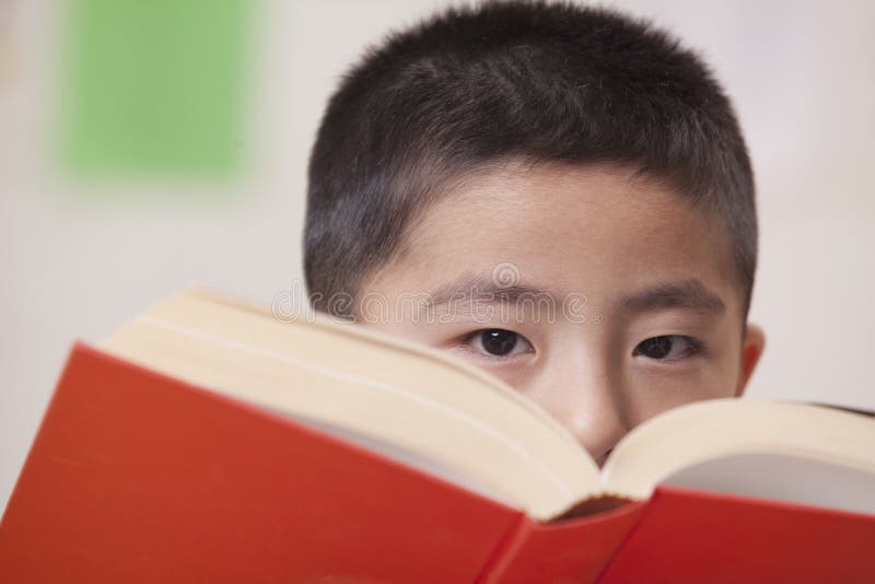 Boy Looking Over Book he S Reading Stock Image - Image of education ...
