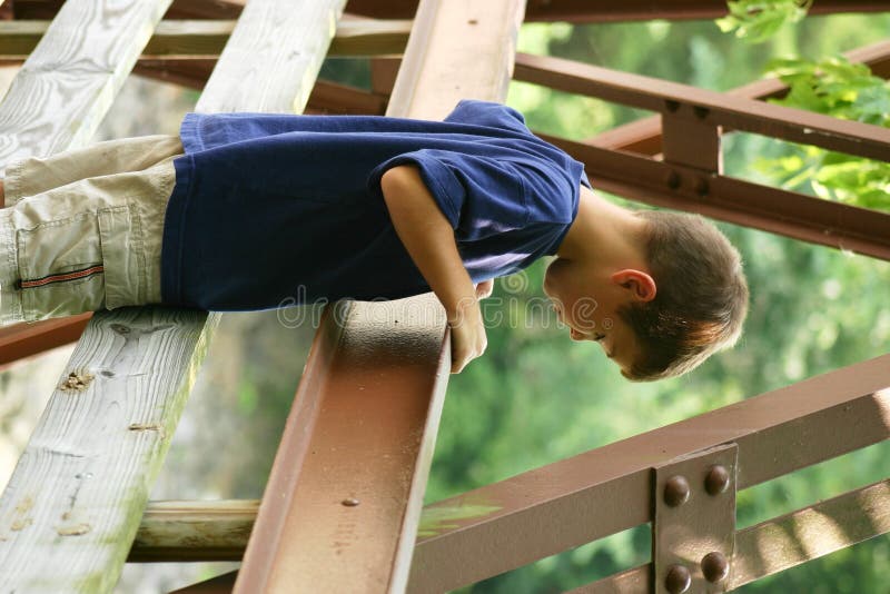Boy Looking Over Bridge stock image. Image of close, little - 1242909