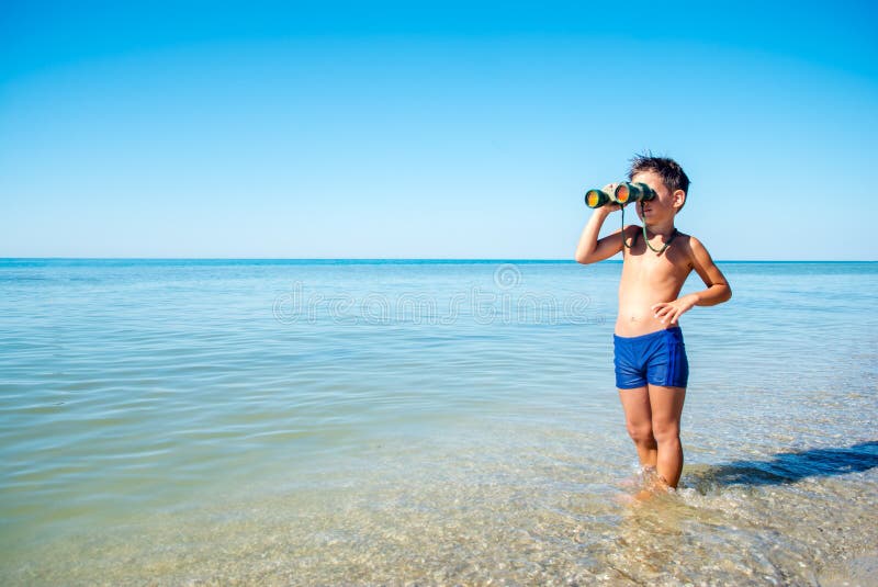 Boy Looks through Binoculars and Sees Sea Stock Image - Image of ...
